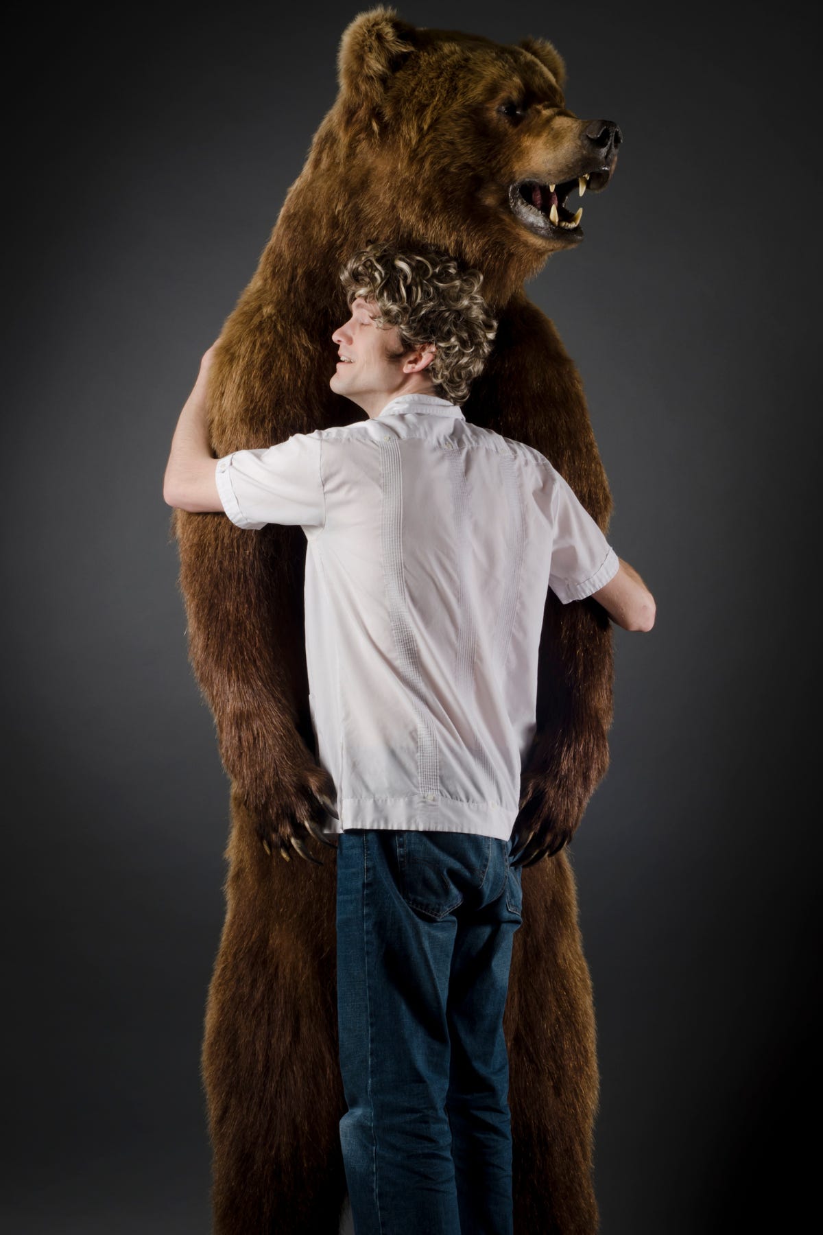 The Dubious Act of Hugging - by Norman T. Leonard