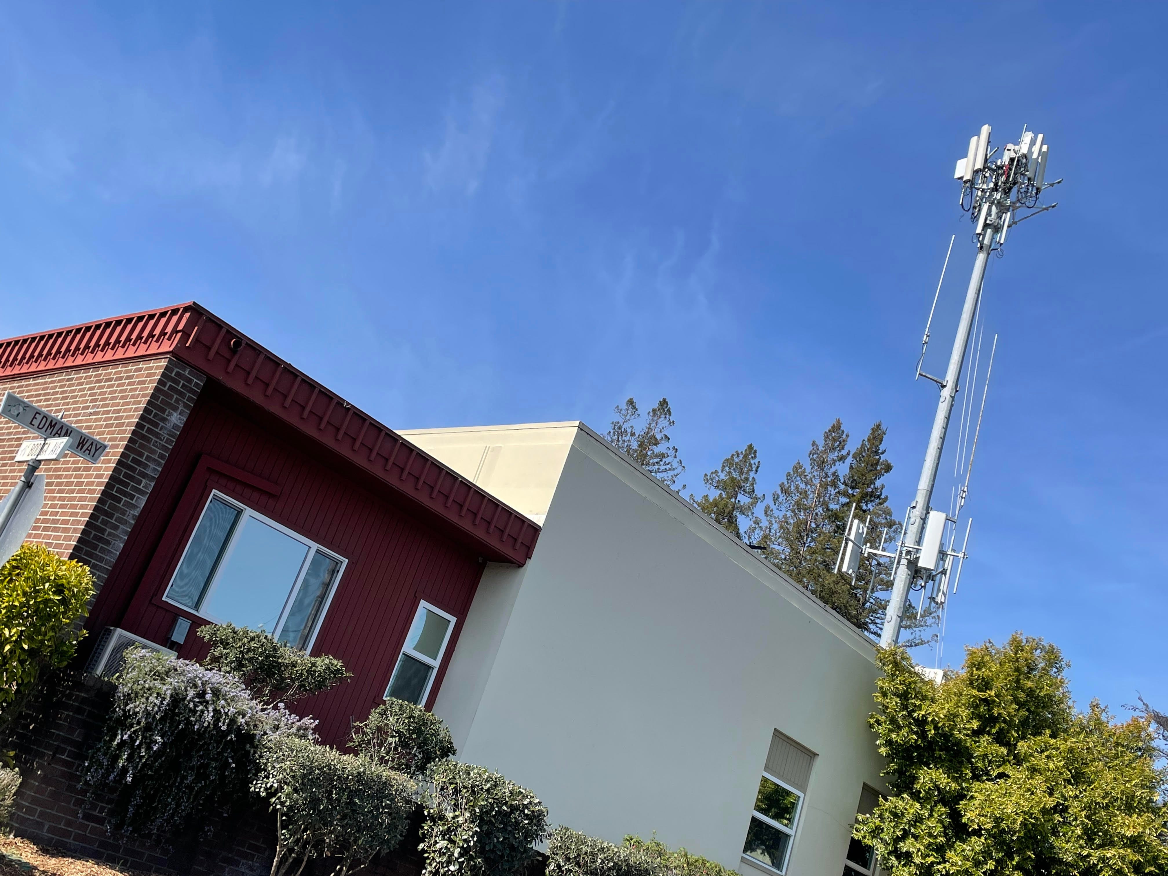 Cell tower expanded above city hall - by Laura Hagar Rush