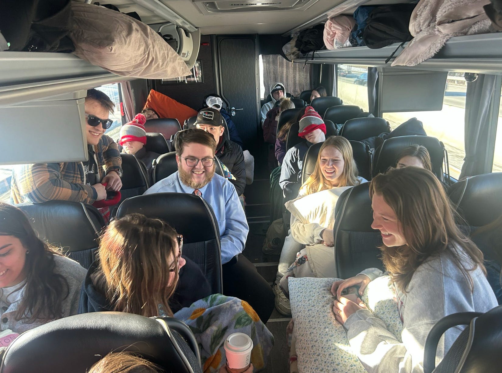 The pilgrims on the bus - by Jack Figge - The Pillar
