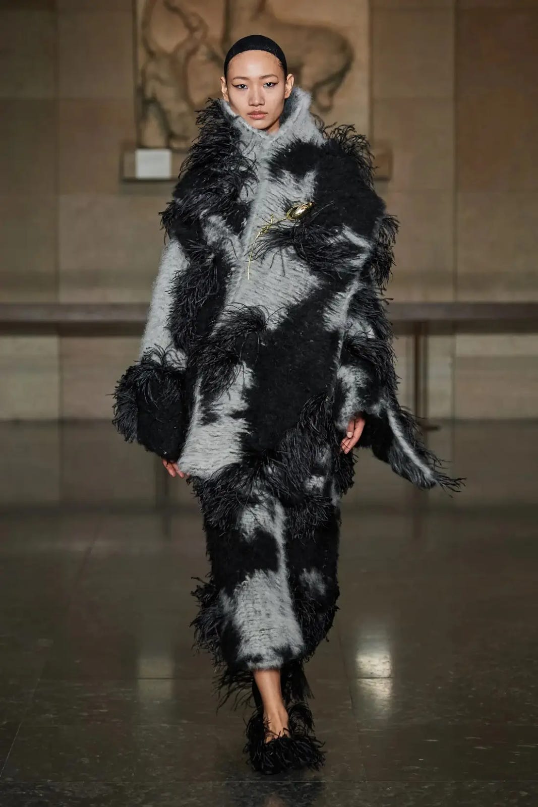 Erdem's Maria Callas inspired opera coat dazzles at LFW 40th Anniversary.