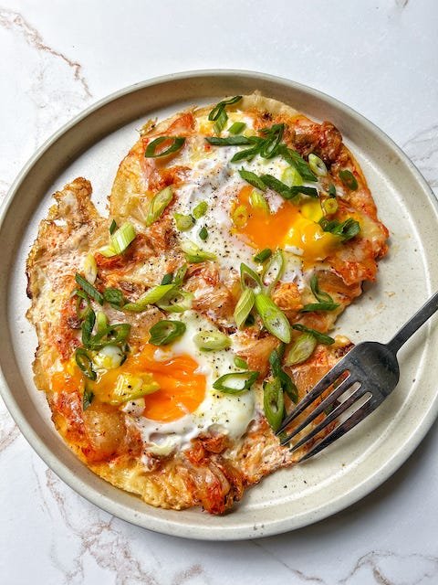 Kimchi Cheddar Tortilla Eggs - by Carina Wolff