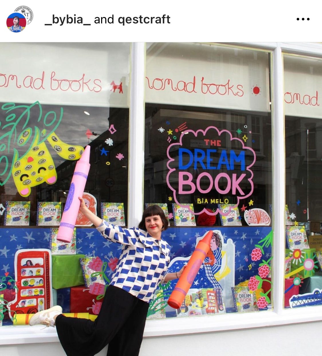 Painting bookshop windows - by Ruby Wright