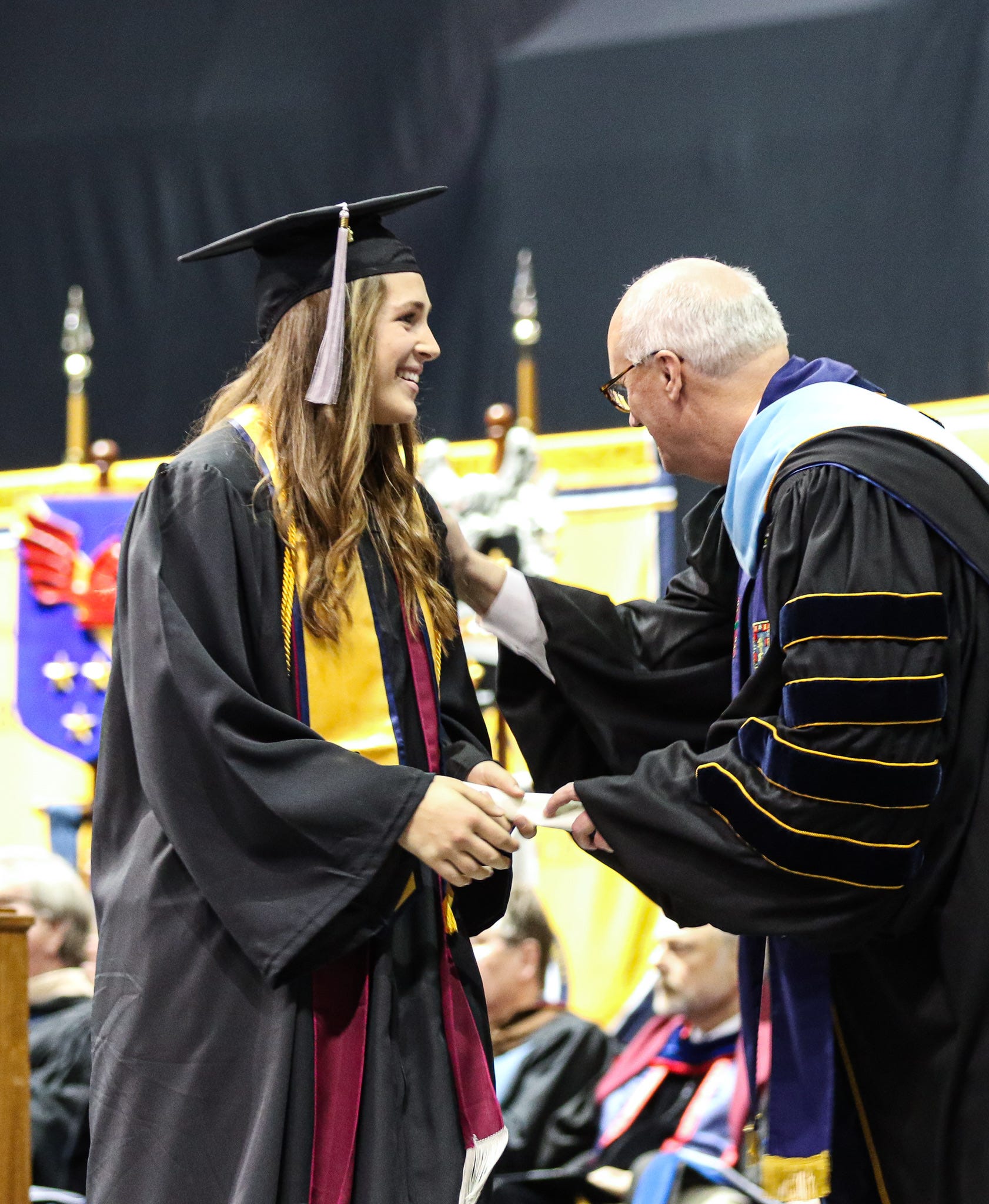 Young cherishes degree, chases championship