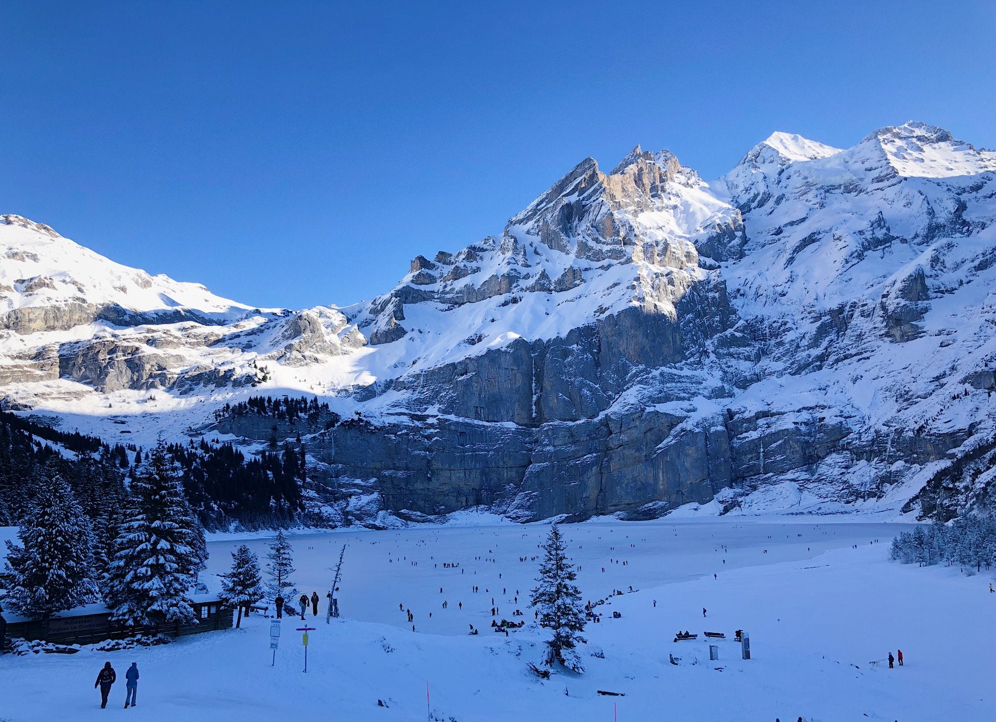 Ice skating on a frozen Alpine lake