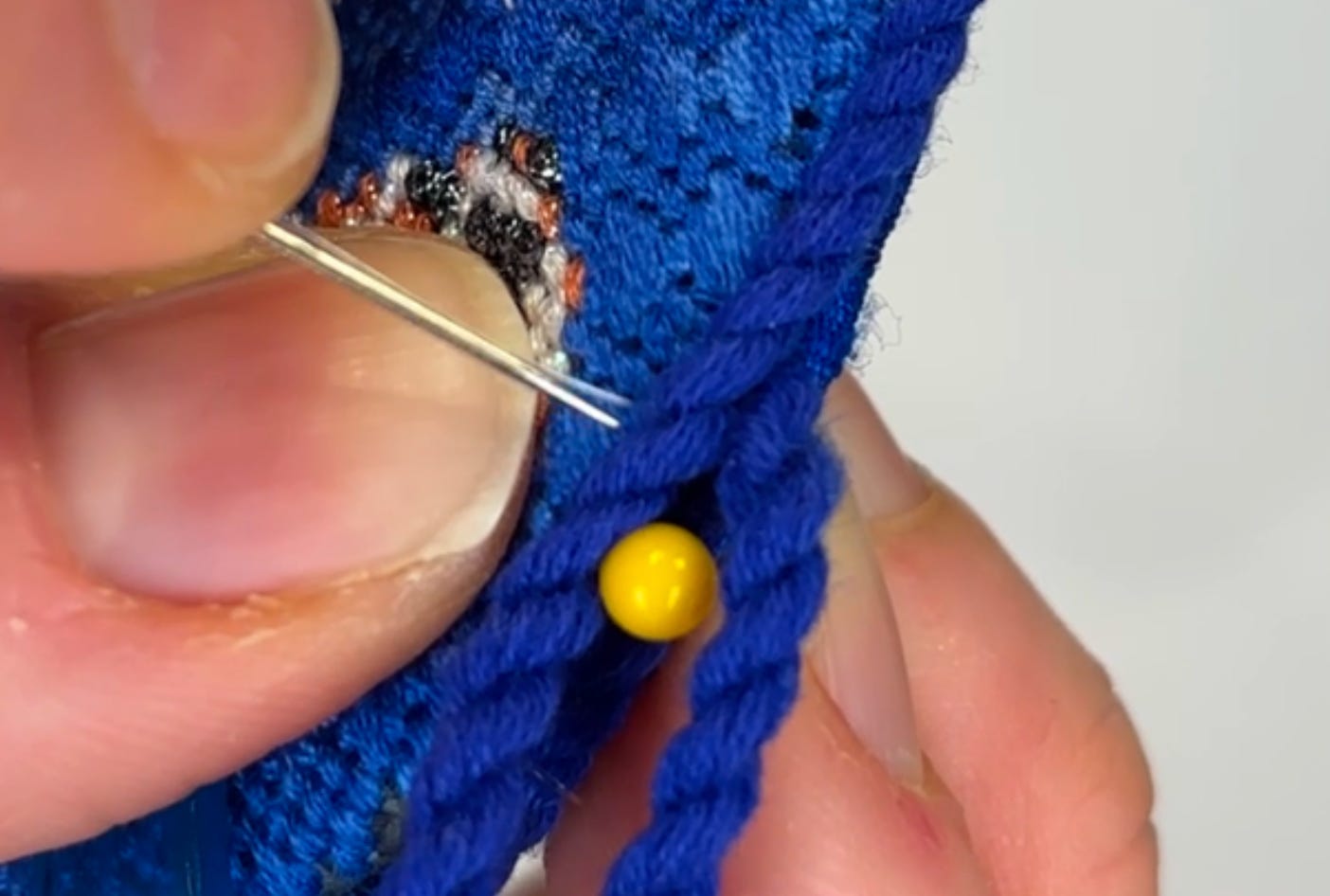 Finish a round needlepoint ornament