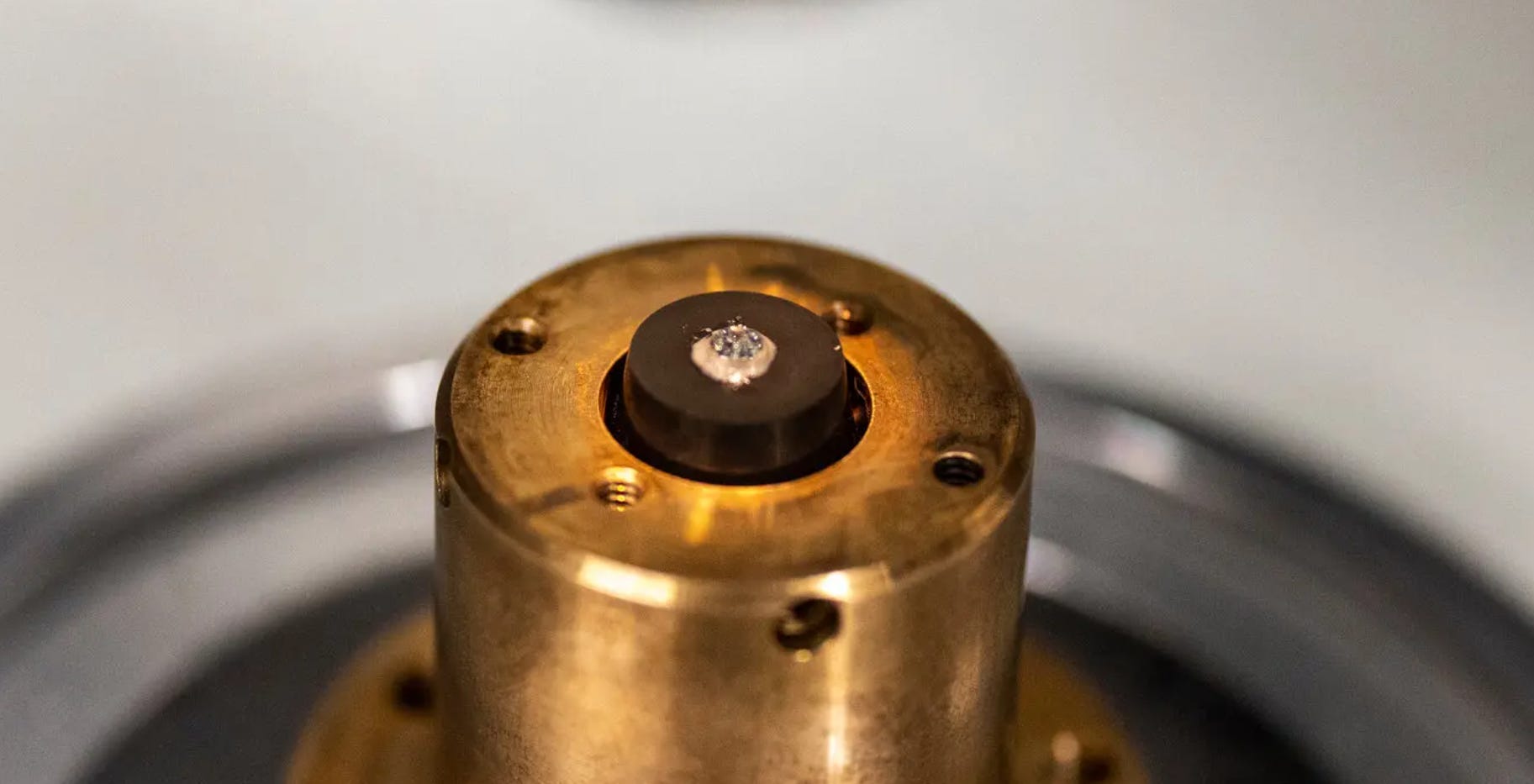 The Room Temperature Superconductor at Near-Ambient Conditions