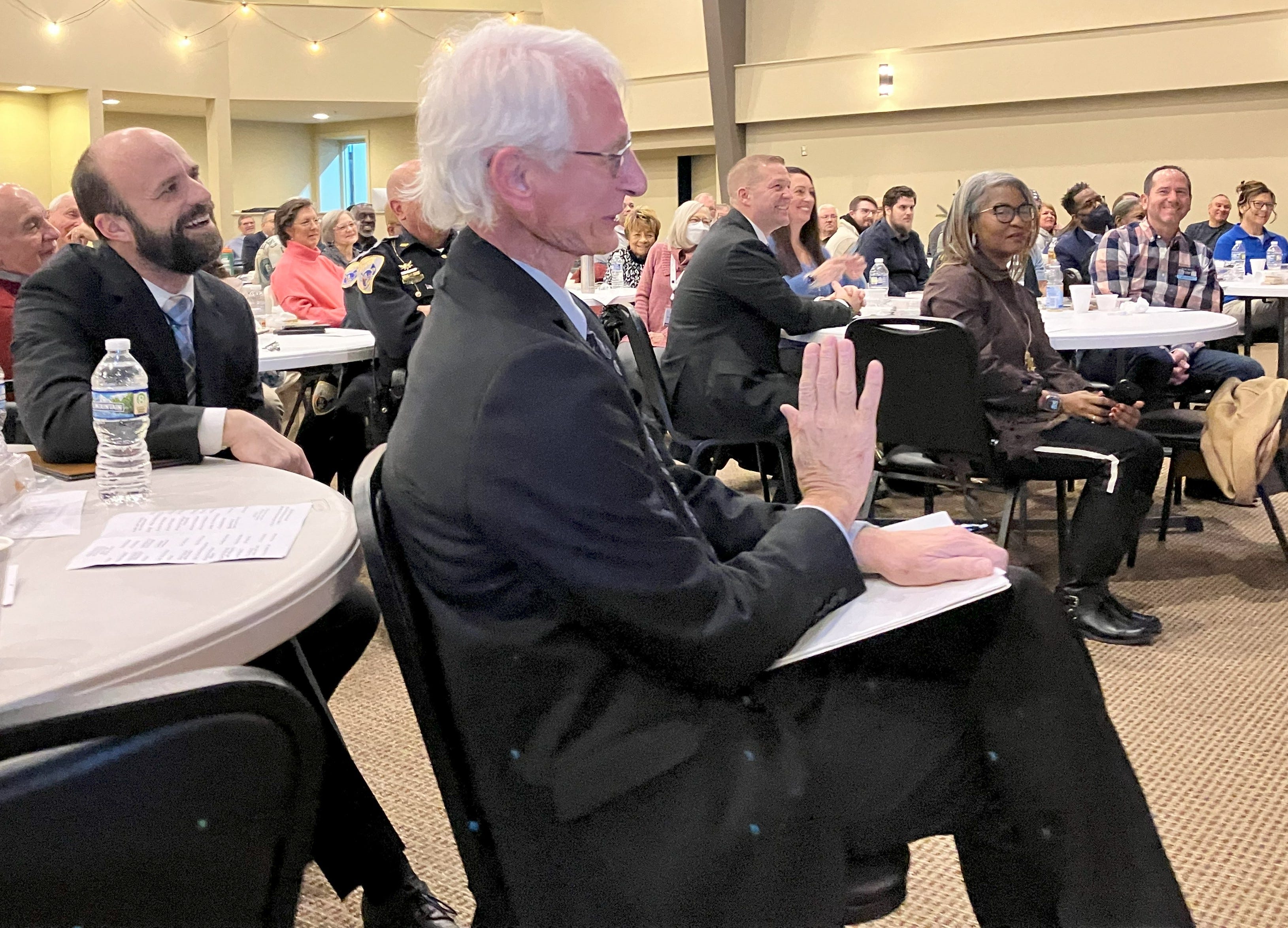 Russell receives Faith in Action award at prayer breakfast