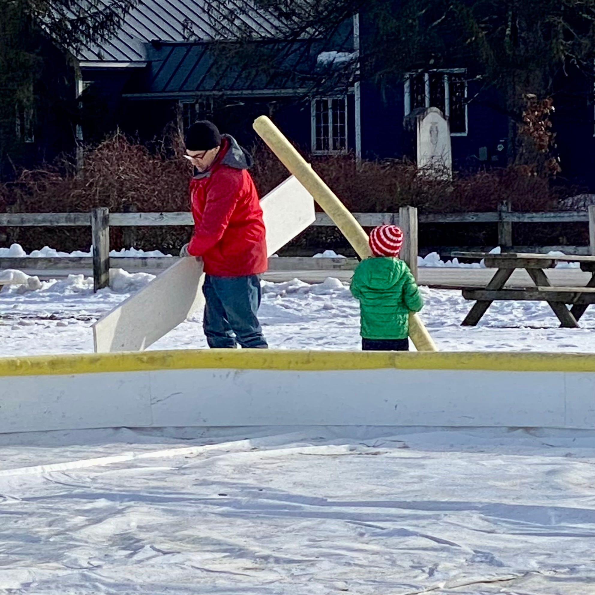 Prepping the rink and patiently waiting for mother nature.