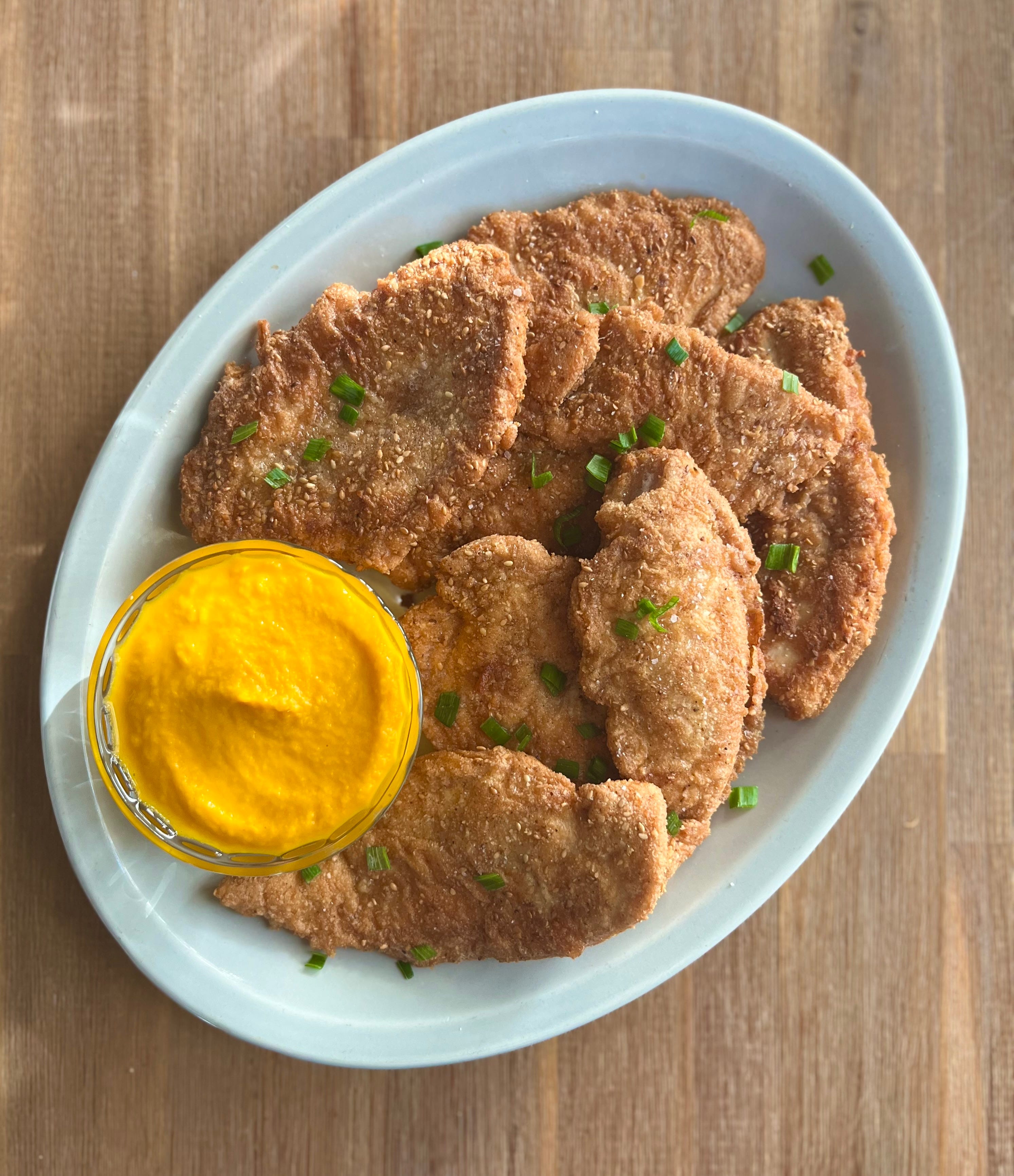 Crispy Chicken Schnitzel with Carrot-Ginger Dressing