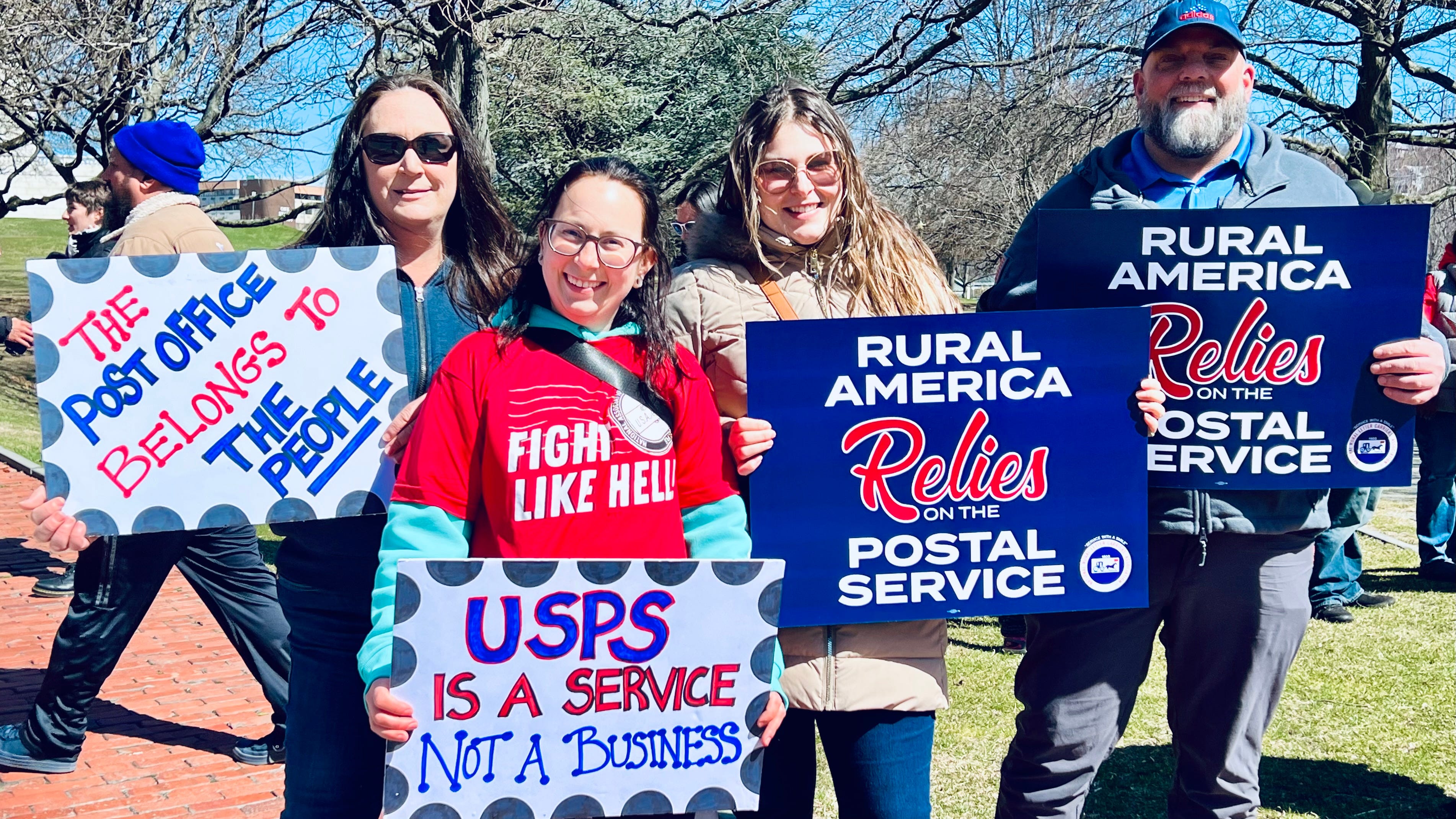 Postal workers and supporters rally against Trump/Muck plans to ...
