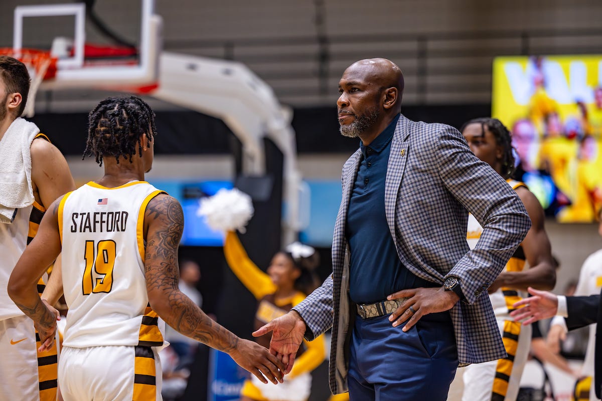 Stafford helps deliver Powell's first victory