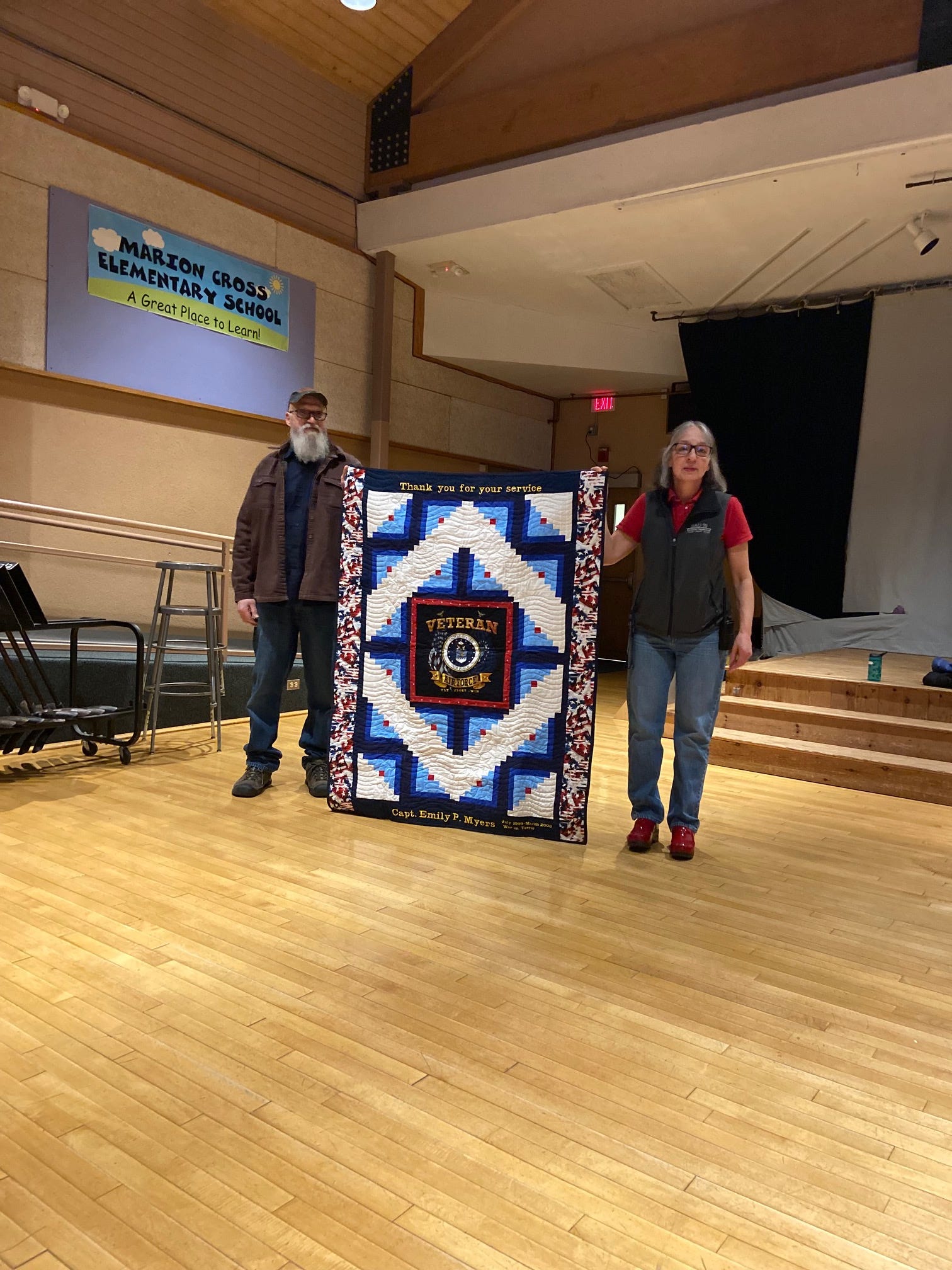Marion Cross students perform a song in honor of a Marion Cross staff ...