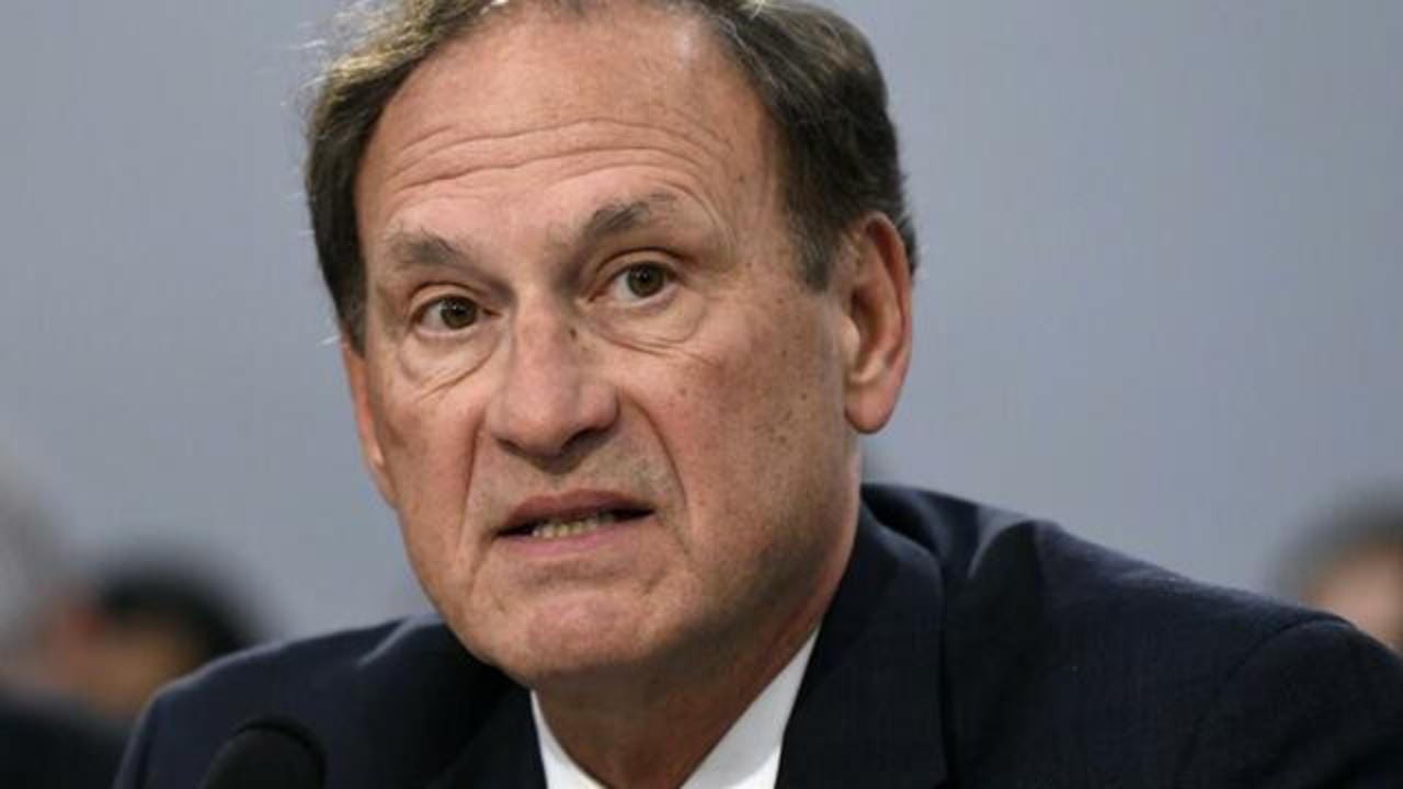 how many fucking flags does Sam Alito salute