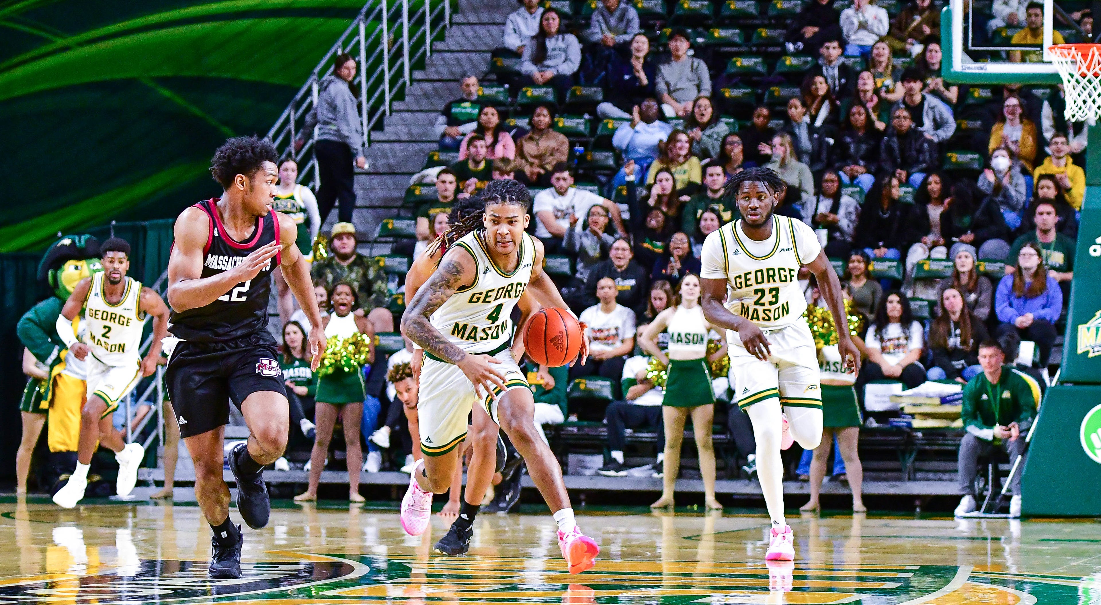 Justyn Fernandez cooks as George Mason runs past UMass