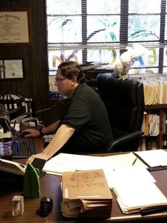Pinot, The Umbrella Cockatoo, At Work With The FutureLawyer.