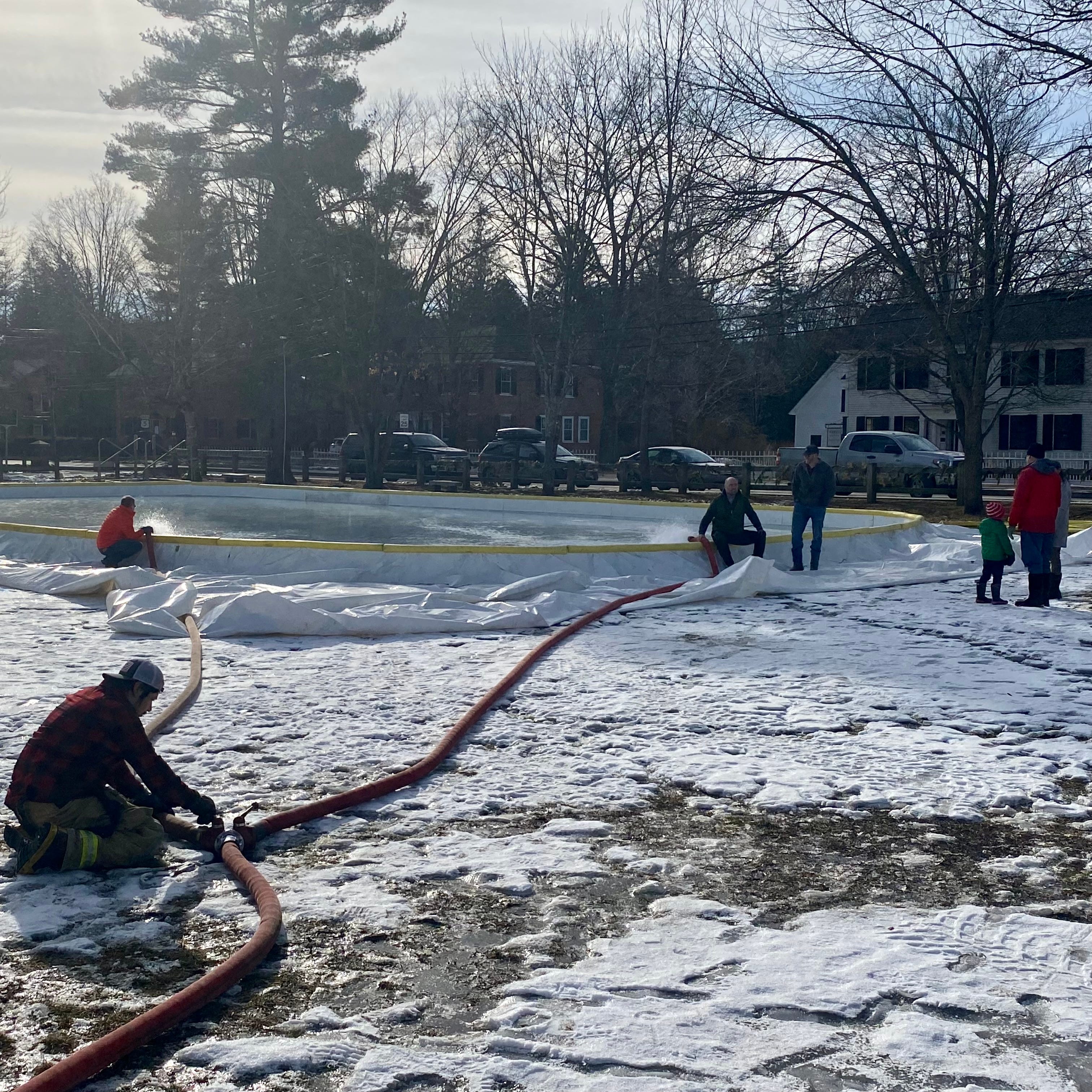 Prepping the rink and patiently waiting for mother nature.