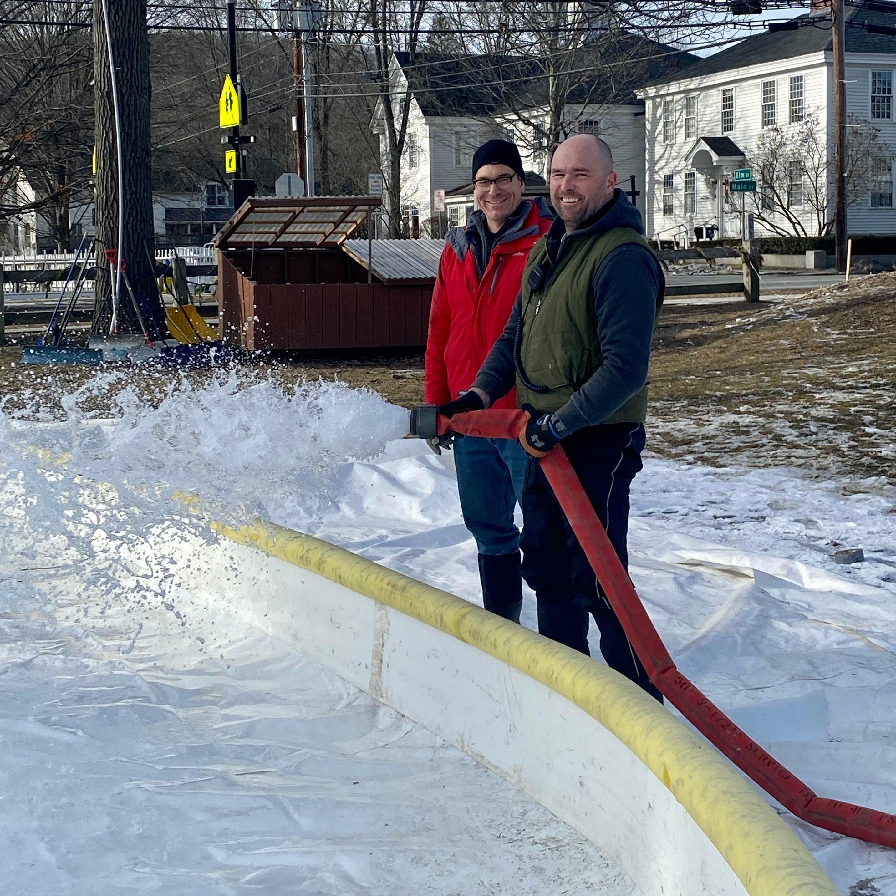 Prepping the rink and patiently waiting for mother nature.