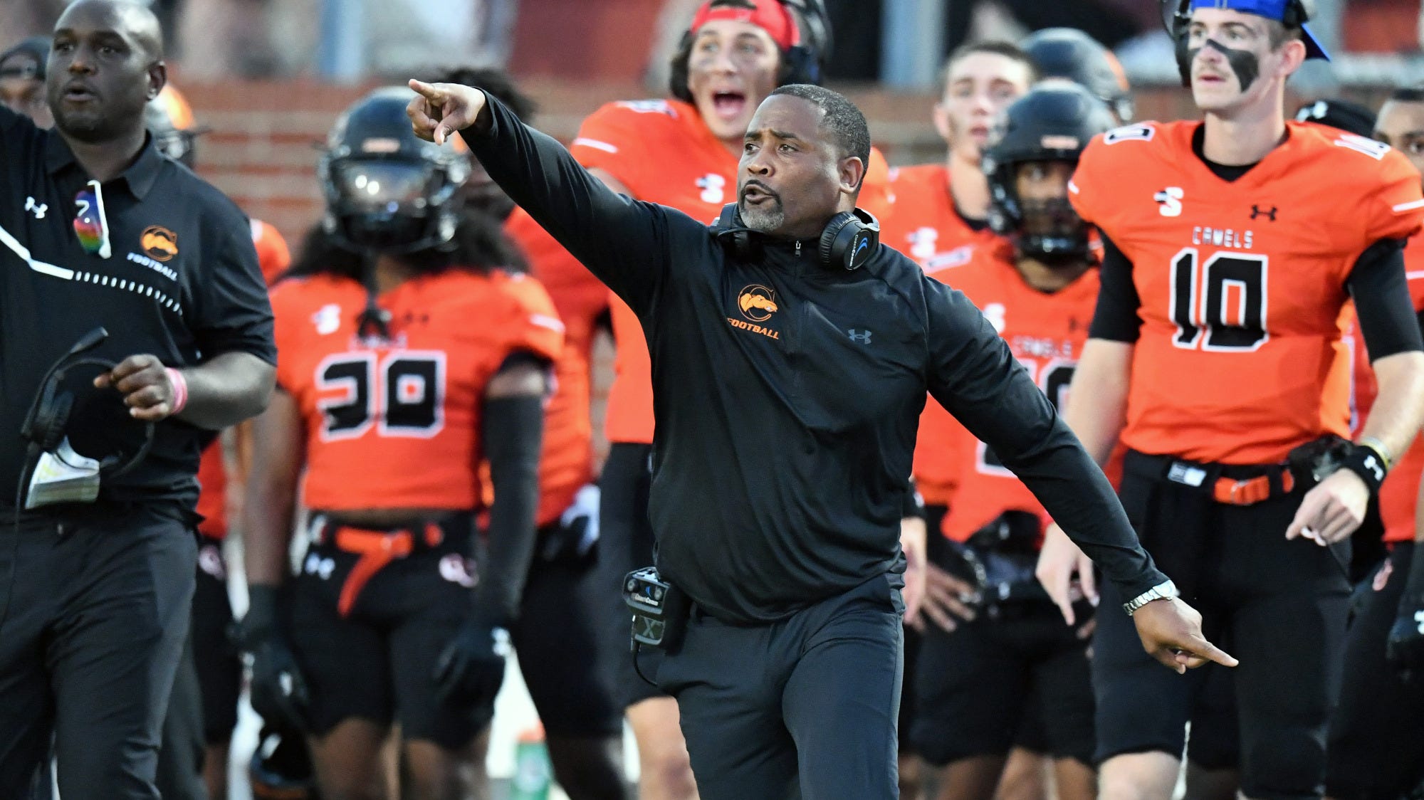 Minter out as head football coach - by Andrew Miller