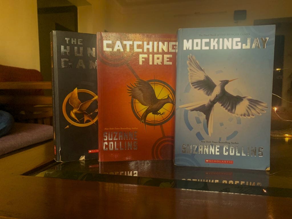 The Hunger Games Series by Suzanne Collins| Book Review
