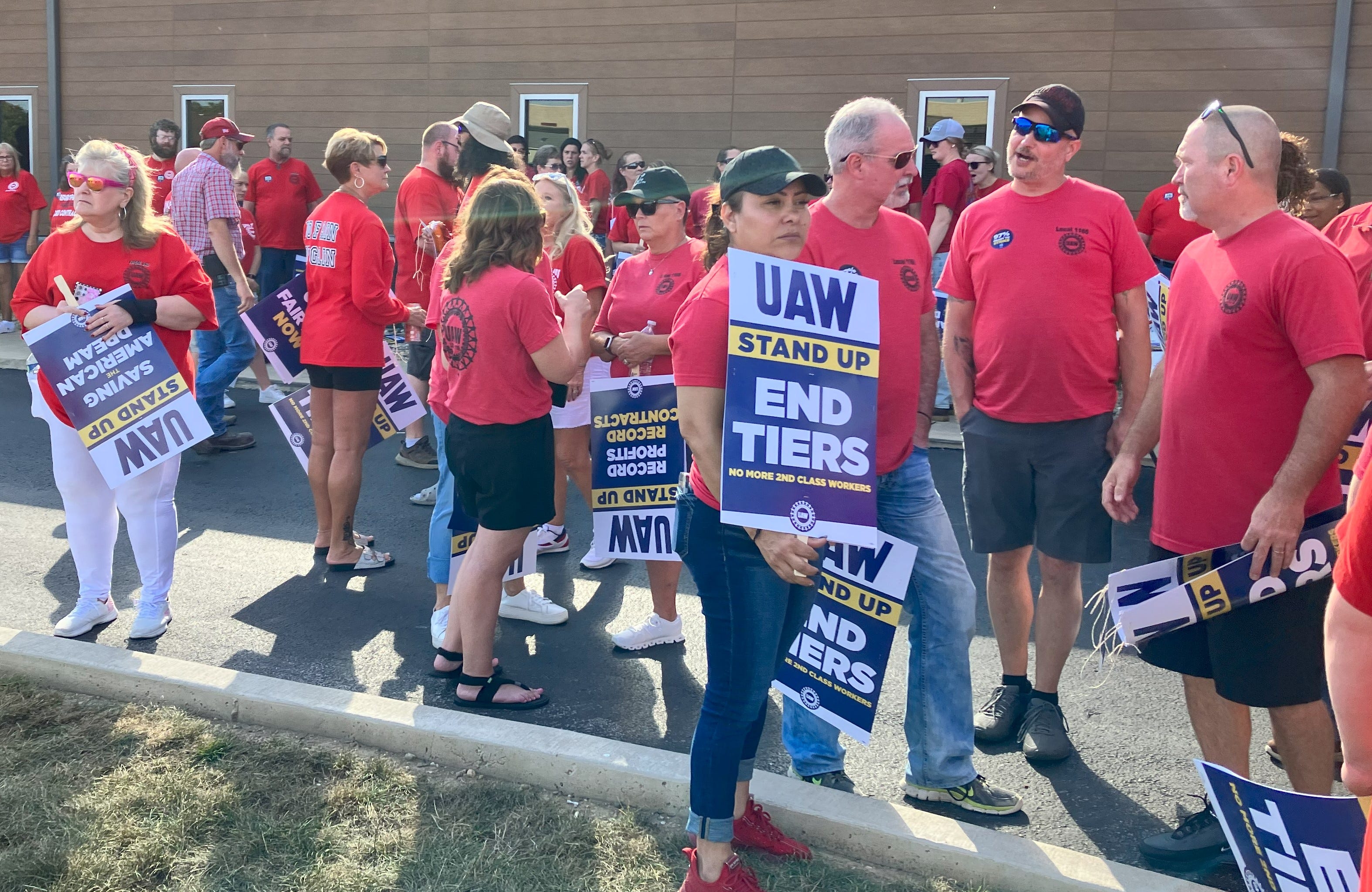 UAW holds 'Red Shirt Rally' and practice picket