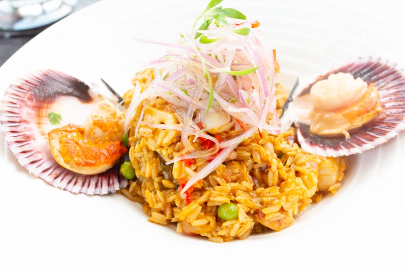 Authentic Spanish Paella Versus Peruvian Arroz Con Mariscos