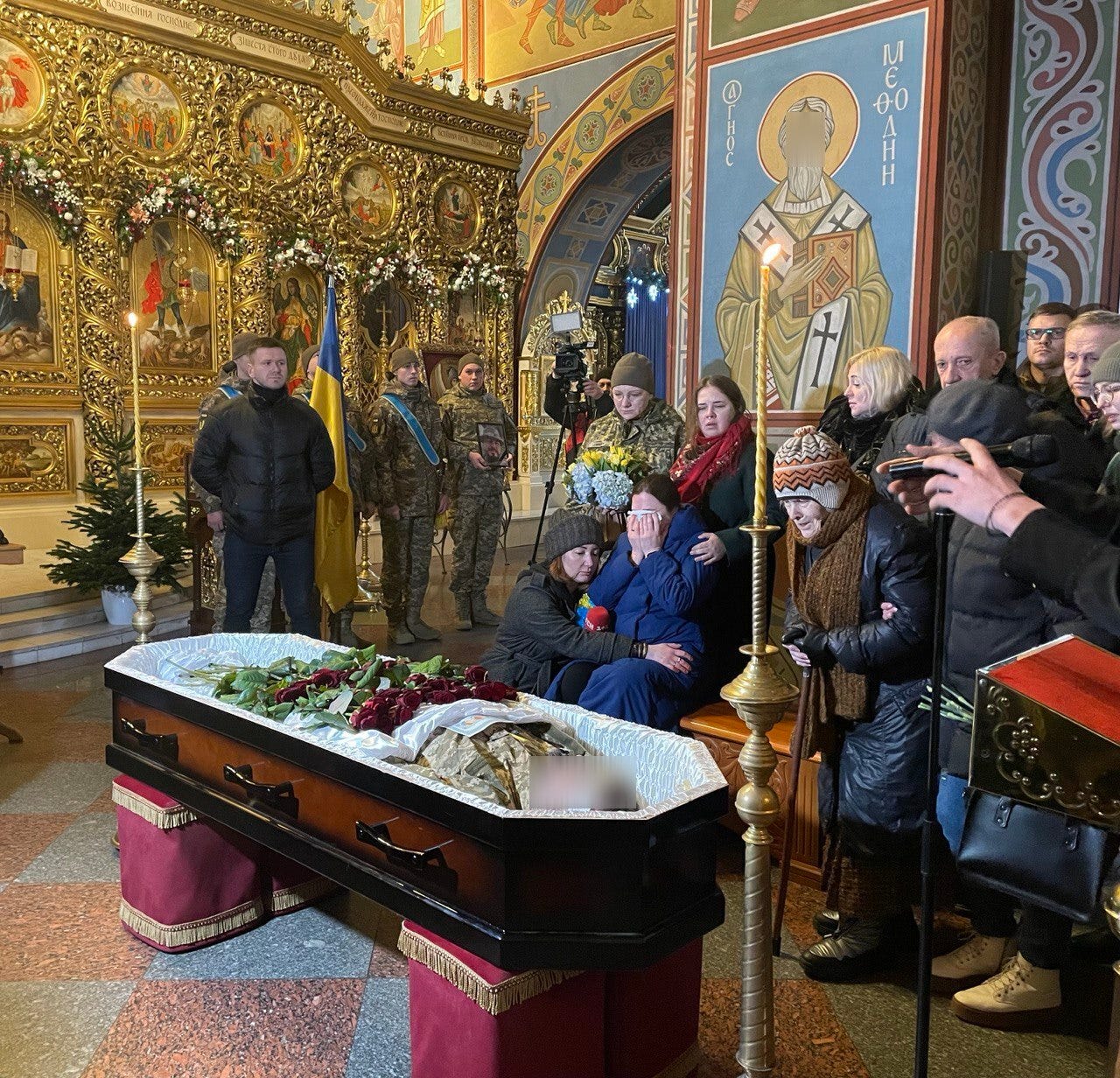 He was killed in combat, while she was pregnant