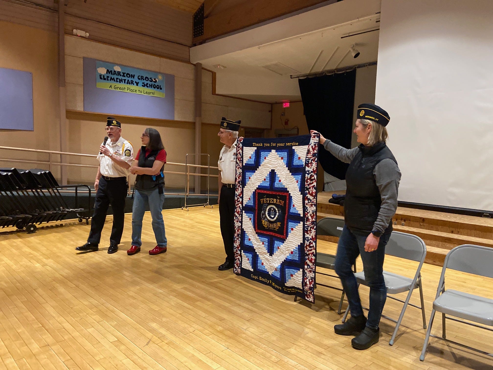 Marion Cross students perform a song in honor of a Marion Cross staff ...