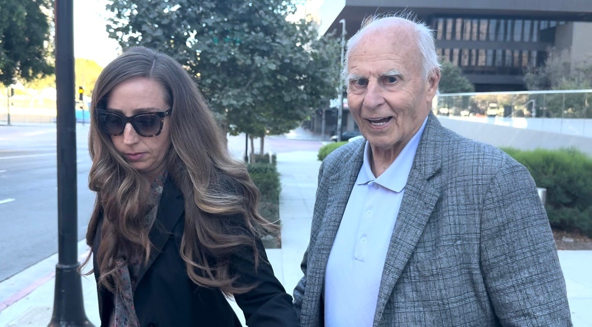 What is Tom Girardi's defense in his client fraud trial?