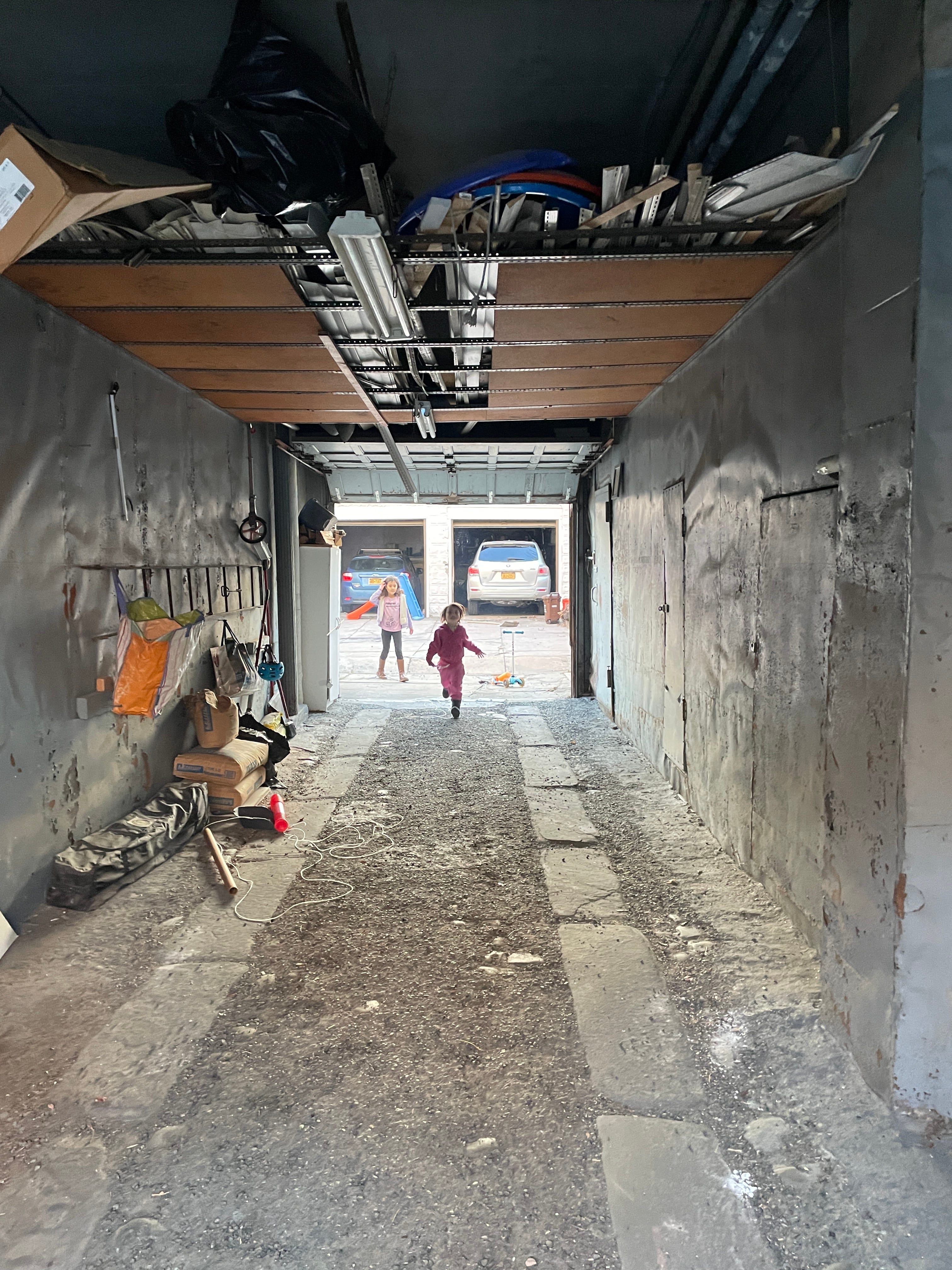 Behind the garage door - by Robina Khalid