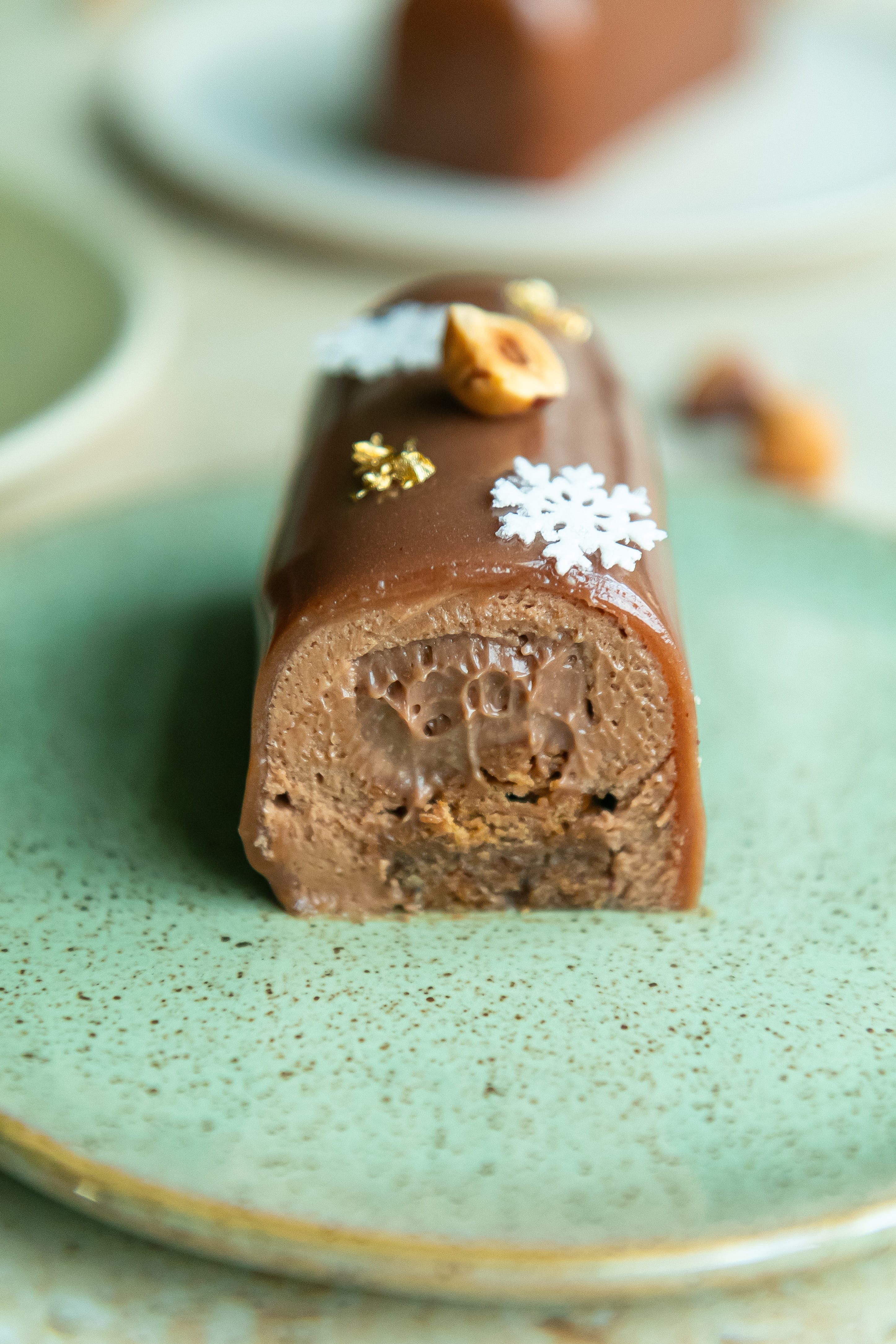 Hazelnut and Chocolate Bûche de Noël - by Camila Marcias