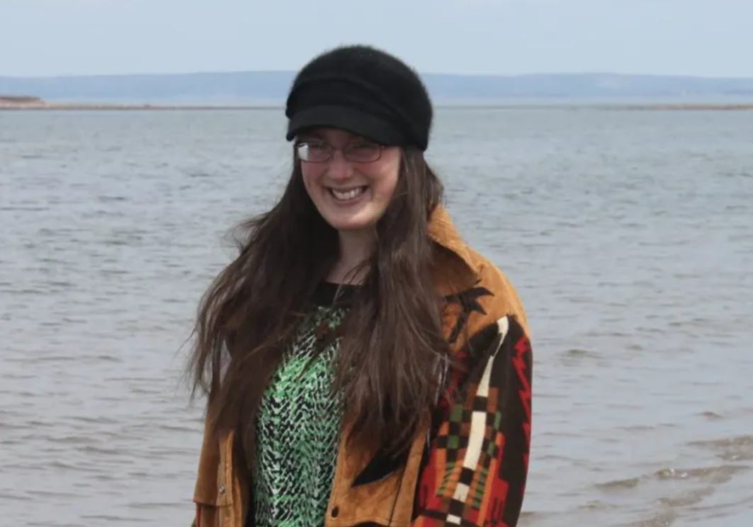 Melanie Tomsons, Never Again International - Canada