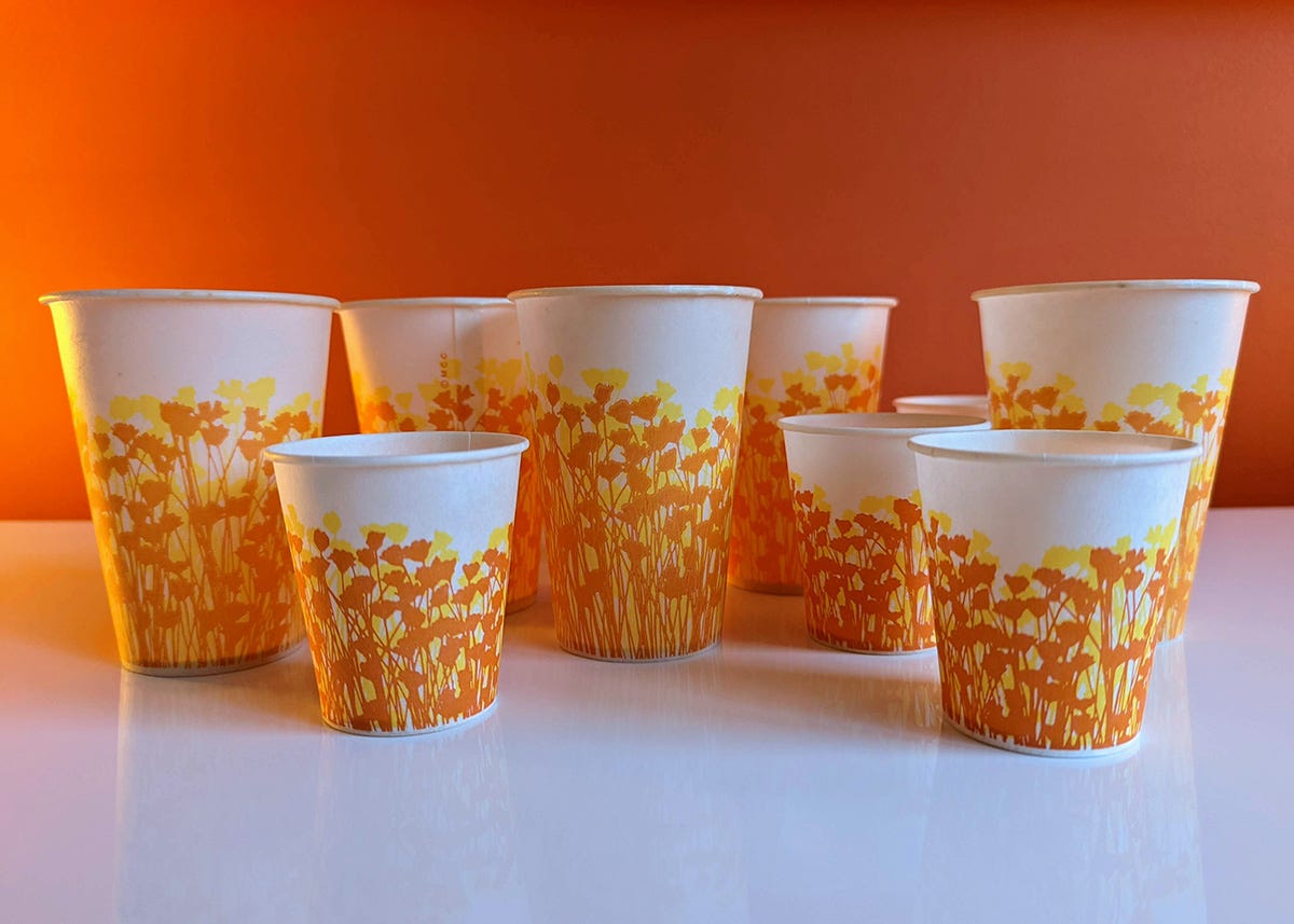 Orange And Yellow Flowers Paper Cups The Retroist