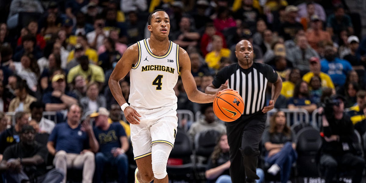 Burnett's 3-Pointer Beats Rutgers in 'Pool(e) Party' Game at Crisler