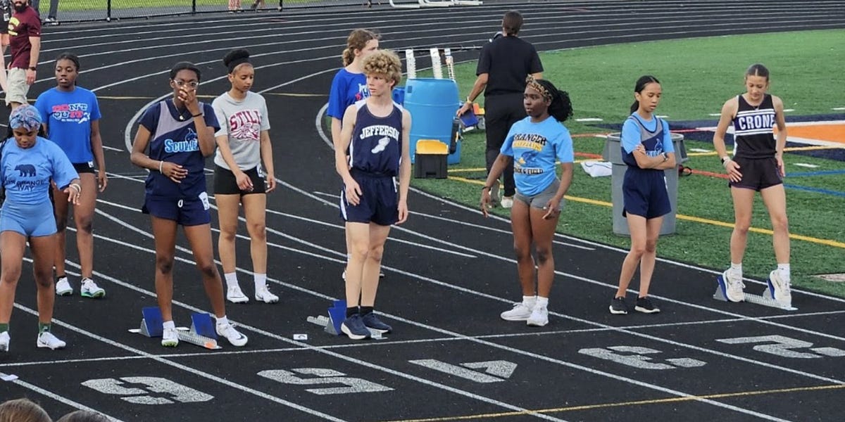 7th grade boy in Illinois wins the 100, 200 and 400 meters at the Naper ...
