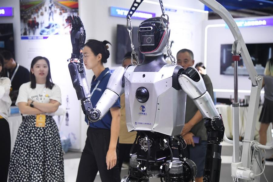 🤖China's Humanoid Robots, Former Huawei Genius‘ Needle-Threading Robot, and Big Tech Reap AI Rewards
