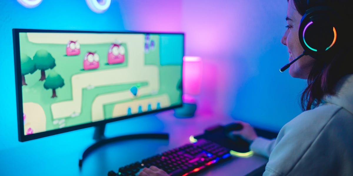 A Model for Sustainable and Accessible Blockchain Games