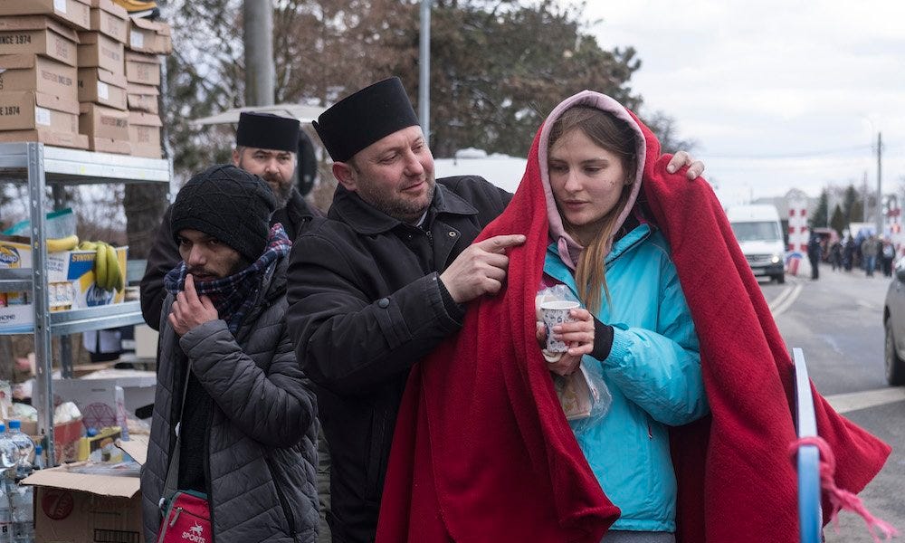 In Photos: Romanian Orthodox Church offers relief to refugees fleeing ...