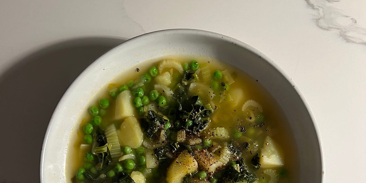 brothy spring soup with celery, kale & english peas