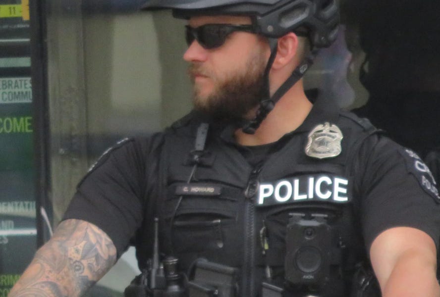 Cop ran red light, stop signs during unauthorized pursuit
