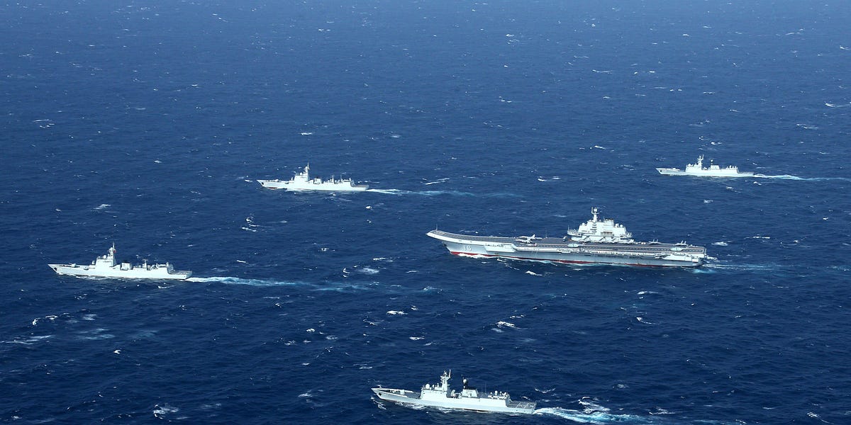 Sean and Angela with Malcom Kyeyune