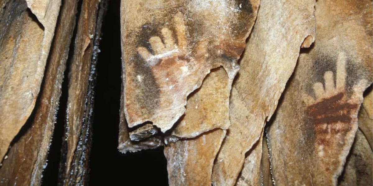 Decoding Prehistoric Handprints: A Tale of Deliberate Digit Removal