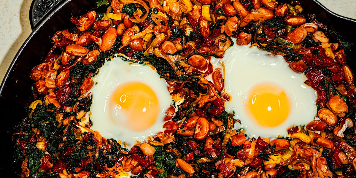 A Recipe for Baked Eggs with Tadka Greens