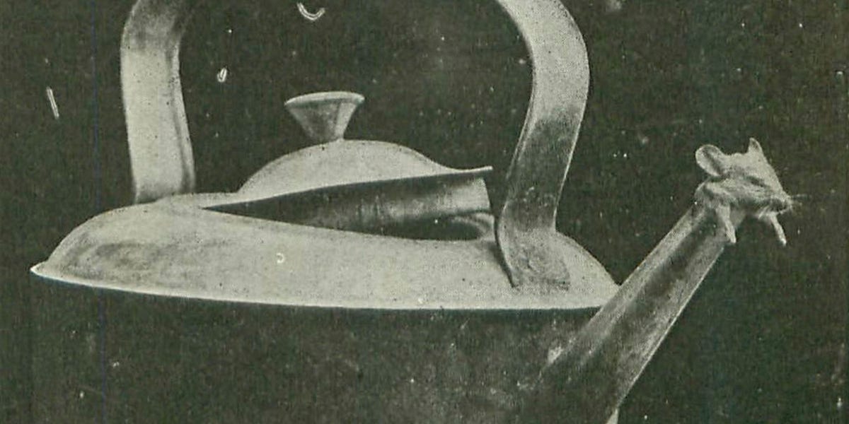 Curious mouse gets stuck in teapot spout