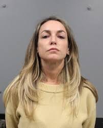 Karen Read Autographs Her Own Mugshot. - Tuesday Gazette