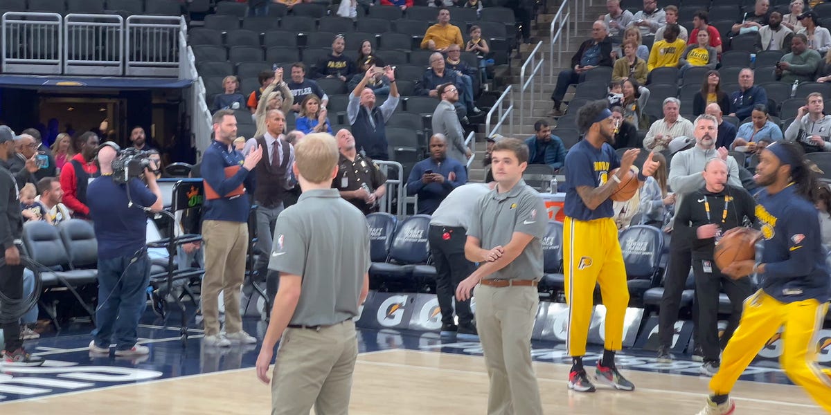 Watch Pacers Hall of Famer Reggie Miller celebrate PR director David Benner