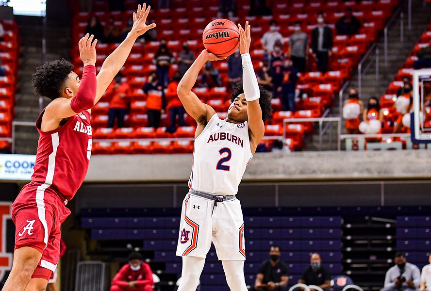 A deeper dive into Sharife Cooper's instant impact on Auburn basketball ...