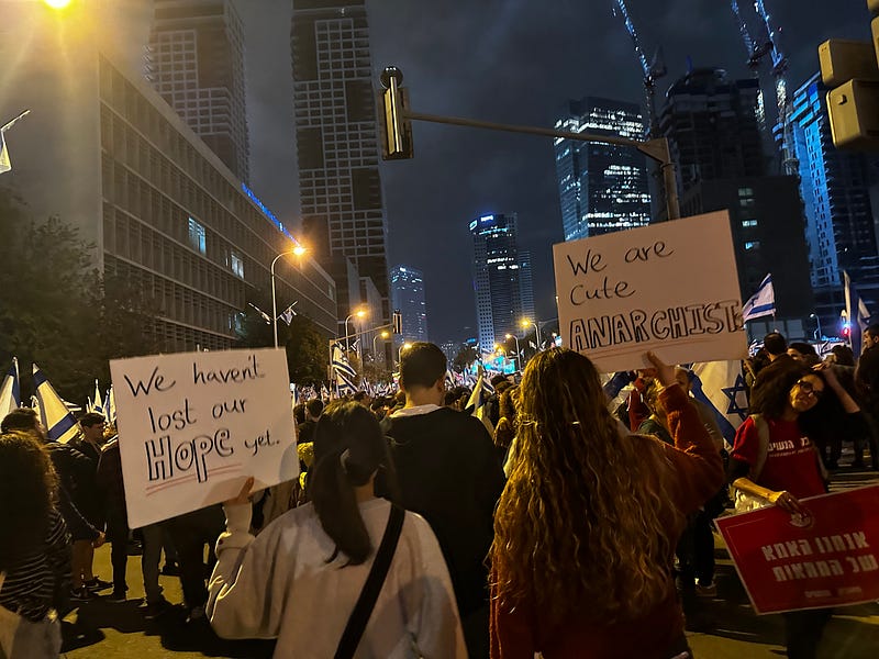 Israeli protest slogans - by blair - Being & Somethingness