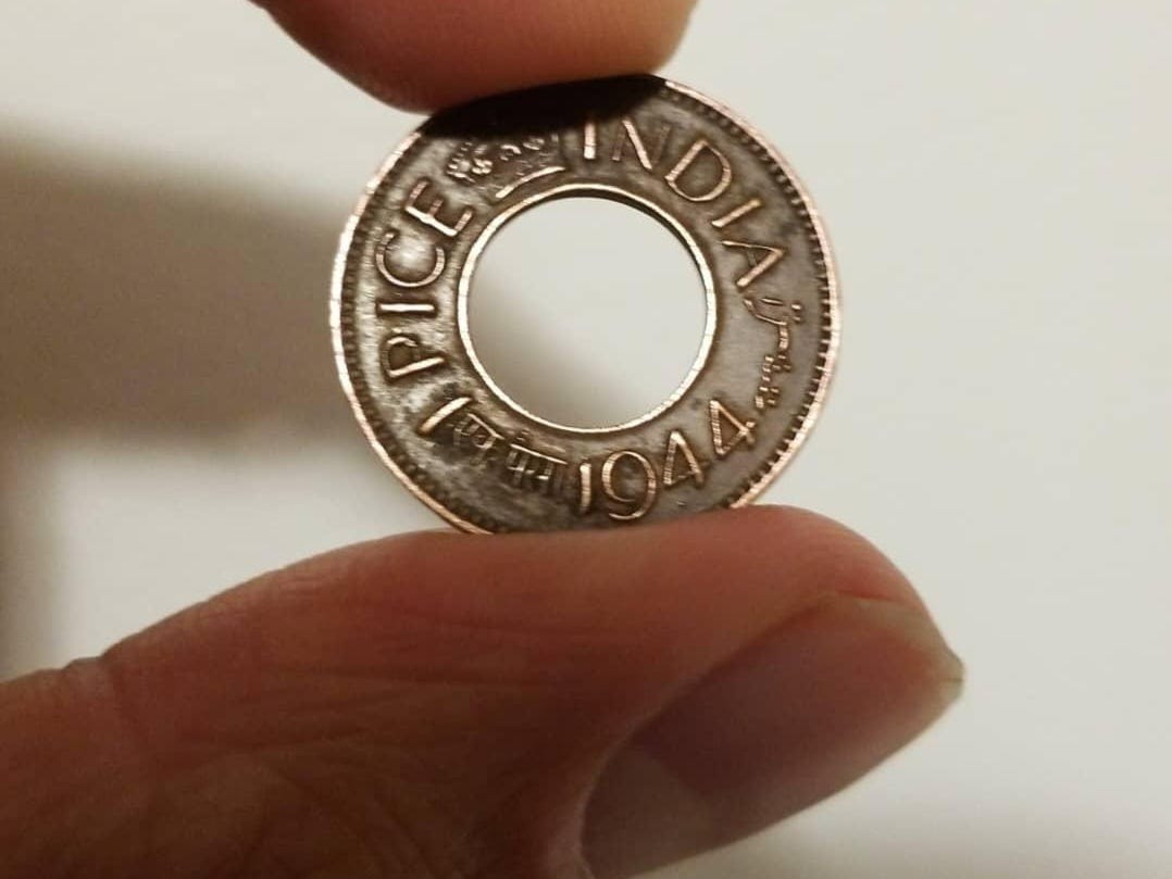 Those Old Coins with Holes in Them? - Brown History