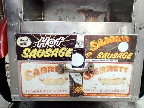 Hot Dog Time Machine: Street cart in TriBeCa has 1970s stuck all over it