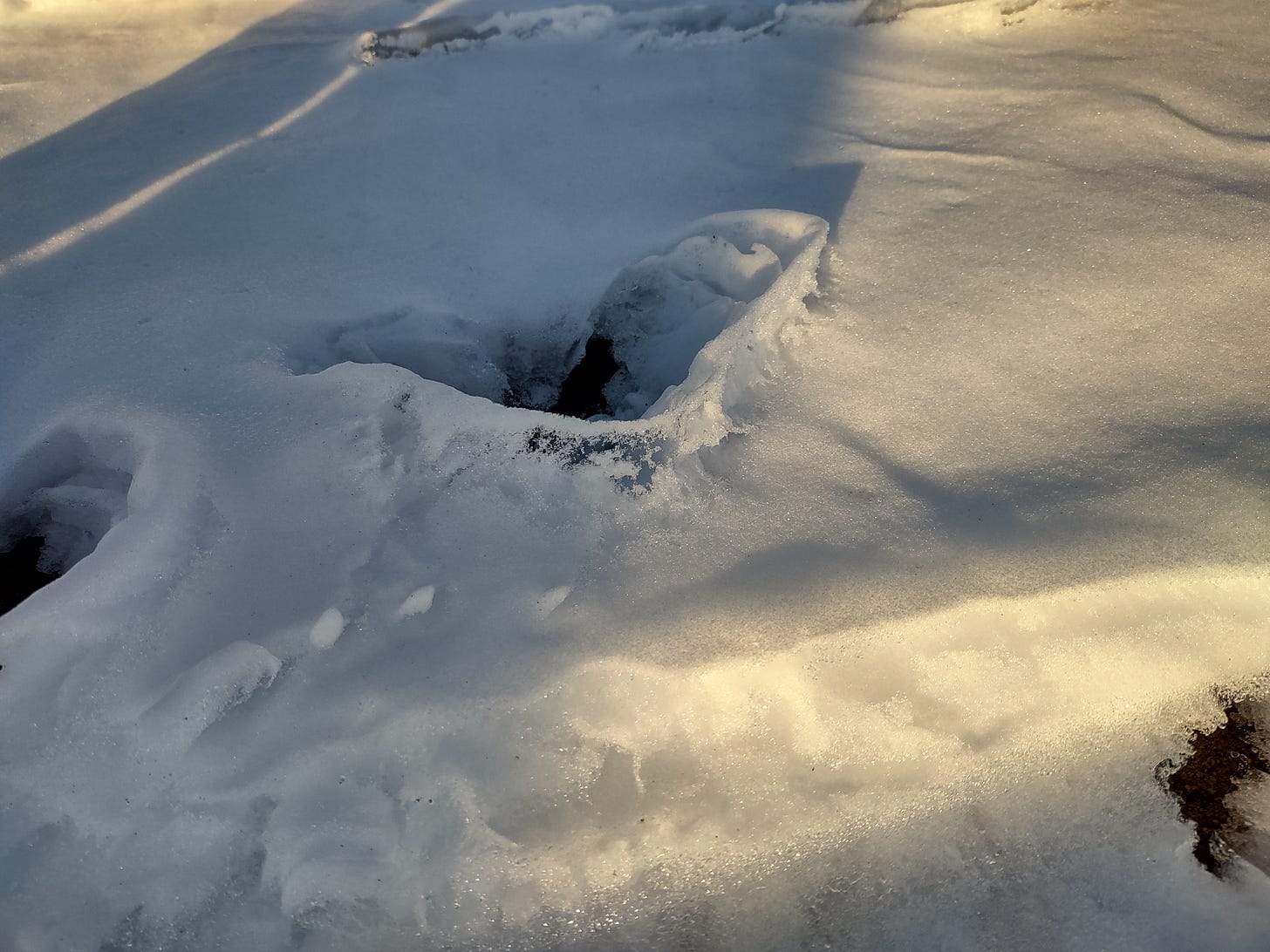 A frozen impact crater - by Hidden-Beach Blog